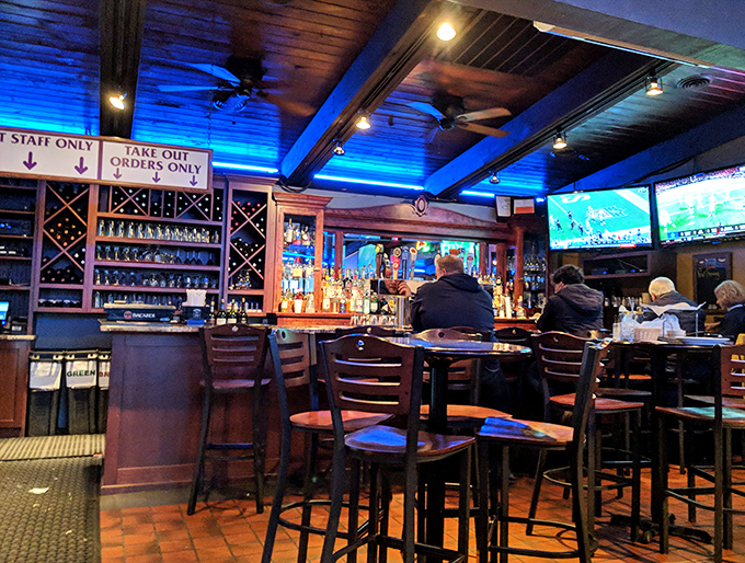 A bar stocked for serious sipping or casual conversation. Where locals debate everything from football rankings to which pizza reigns supreme.