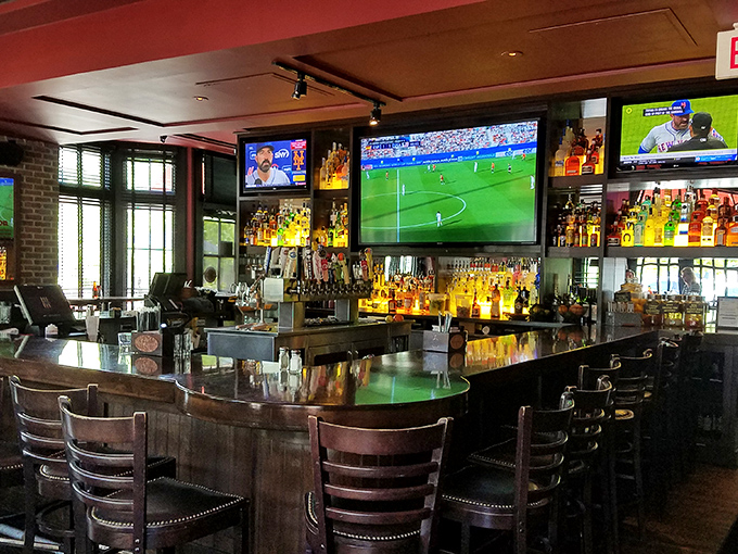 A bar that beckons with amber bottles and multiple screens&mdash;because sometimes you need sports with your spirits. The perfect perch for solo diners.