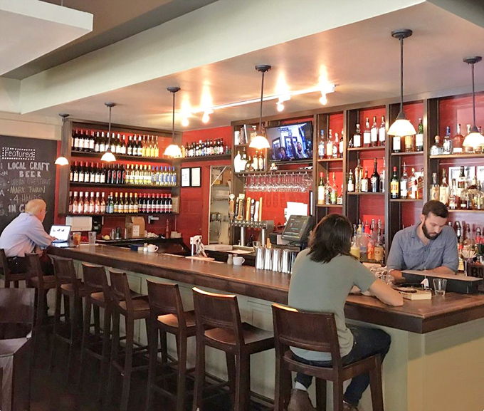 A well-stocked bar where craft beers stand ready to meet their burger soulmates. Beer-burger matchmaking at its finest.