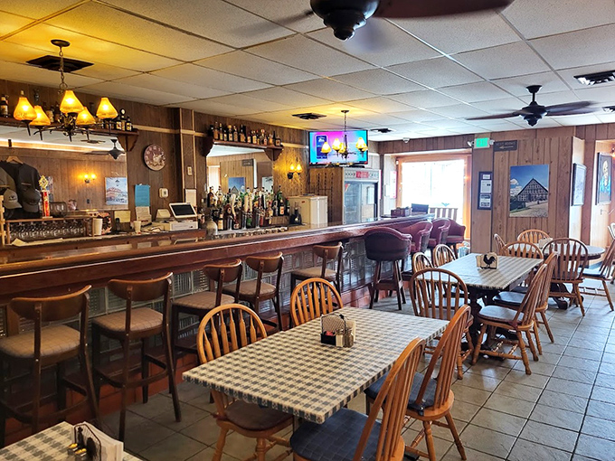 The bar area offers another perspective on this beloved institution, where locals gather to share stories and stellar meals.