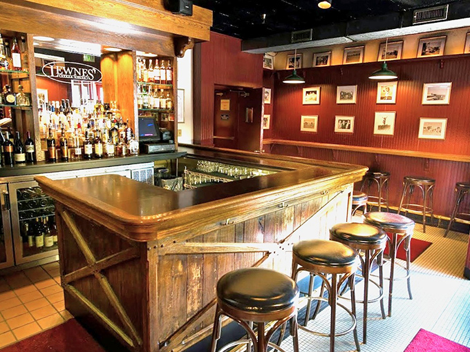 A bar that says, "Pull up a stool, friend. Your Manhattan is about to make everything better." 