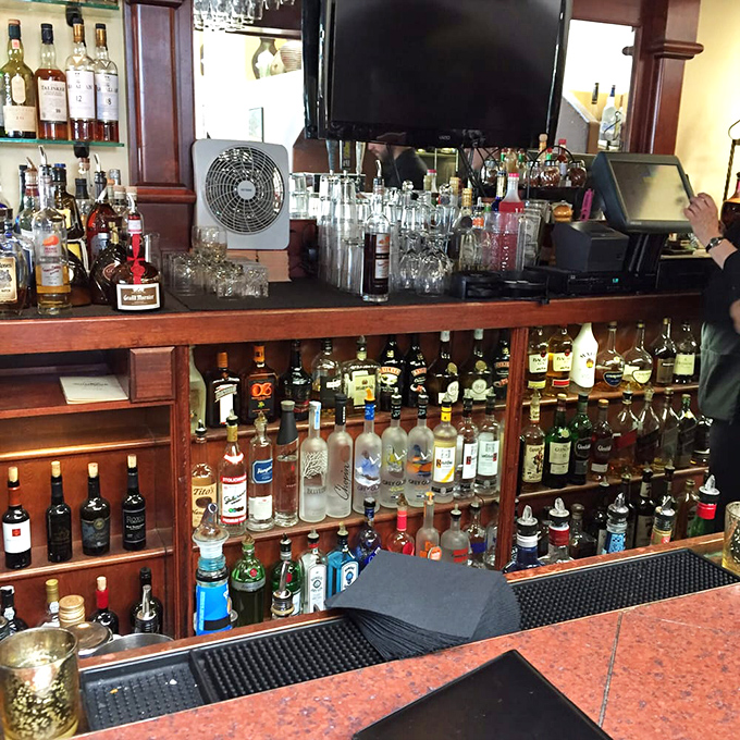 A bar stocked so thoroughly it looks like it's preparing for both the end of prohibition and the apocalypse.