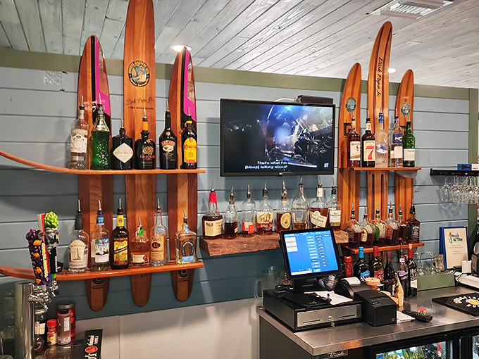 The bar's water-sports theme with vintage surfboards proves that good taste extends beyond just what's on your plate.