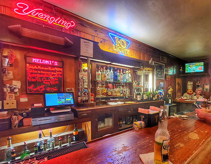 Neon beer signs cast their colorful glow over a bar that's witnessed first dates, business deals, and countless celebrations &ndash; all fueled by good drinks and better food.