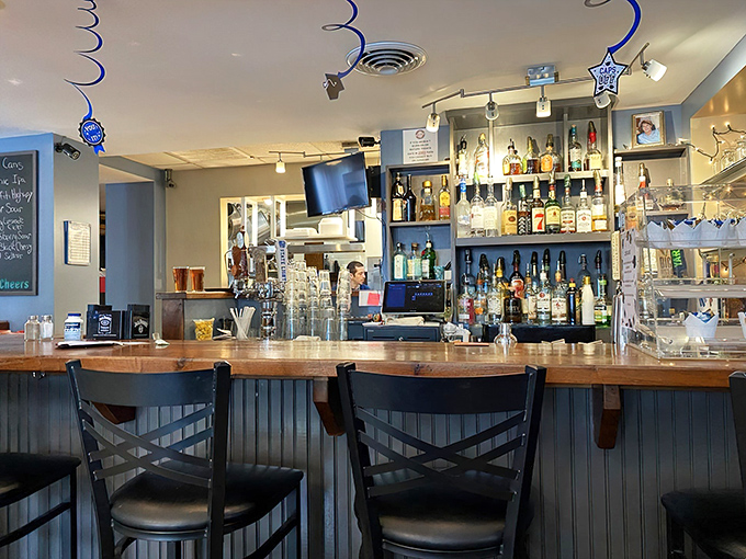 The bar area beckons with promises of good drinks and even better conversation with fellow food lovers.