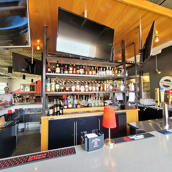 The bar shelves tell stories of possibilities&mdash;each bottle a potential character in your evening's narrative at Fast Eddie's.