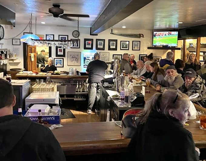 The bar area&mdash;where sports on TV meet stories told over cold drinks. A neighborhood gathering spot where "just one more" is the most common phrase.