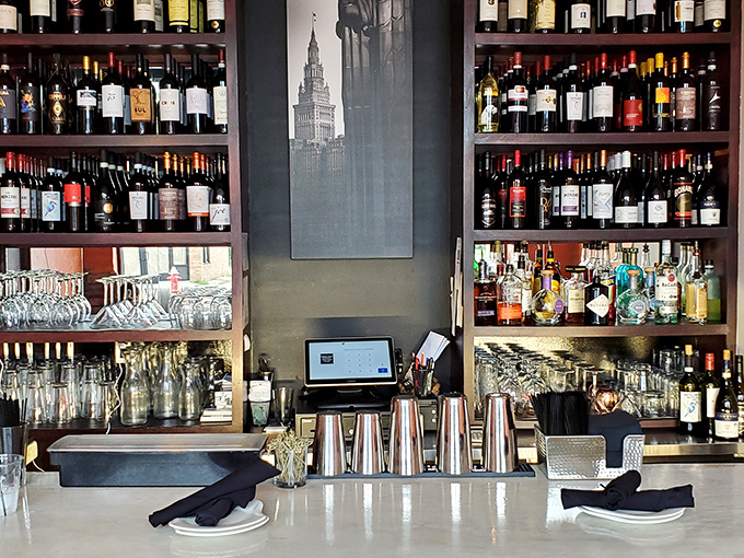The well-stocked bar area promises the perfect wine pairing for whatever culinary adventure you're planning tonight.