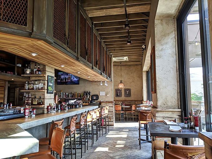 The bar stretches out like an invitation to stay awhile, with enough taps to make decisions delightfully difficult.