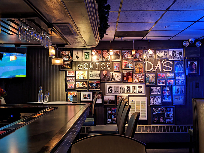 The bar area wall serves as a visual history lesson, photos and memorabilia telling stories of good times had over decades of perfect pasta.