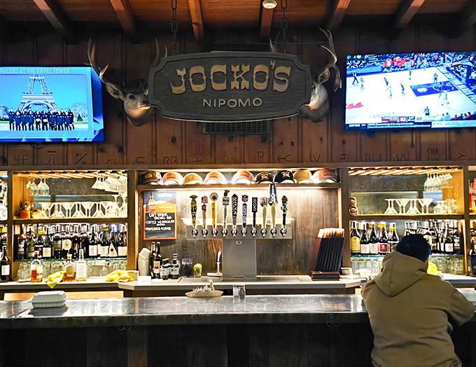 The bar area where "I'll just have one drink" turns into "Let's see that steak menu." Those deer mounts have witnessed countless celebrations and first dates.