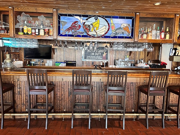 A bar that says, "Pull up a stool, tell me your troubles, and I'll solve them with cold drinks and hot seafood."