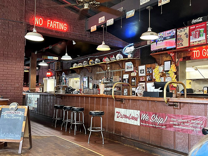 The "No Farting" sign speaks volumes about Dreamland's sense of humor. This is a place that takes its BBQ seriously but itself? Not so much.