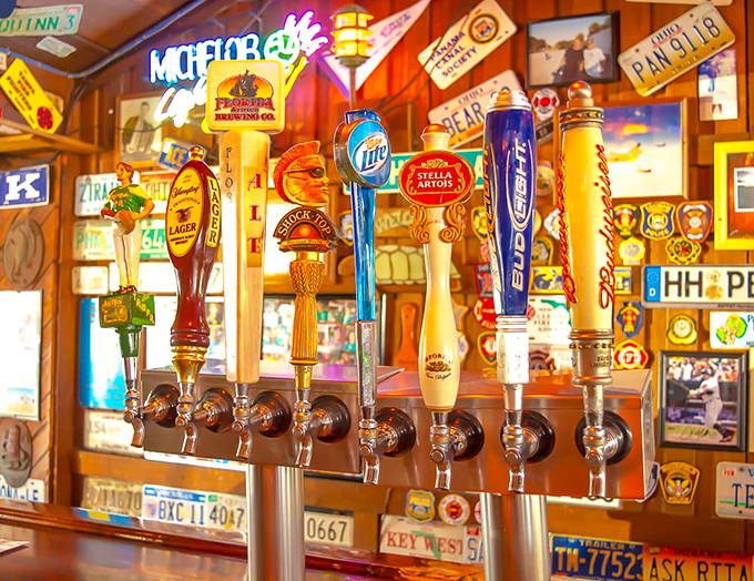 A tap lineup that would make a craft beer enthusiast weep with joy, backed by enough neon to guide ships safely to shore.