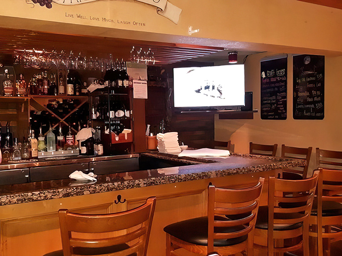 The bar area—where strangers become friends and friends become family, all over a glass of Chianti and sports on the TV.