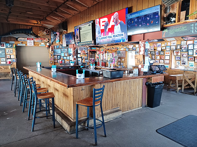 The bar area combines sports-watching convenience with nautical charm – like your favorite uncle's man cave, if he lived on a yacht.