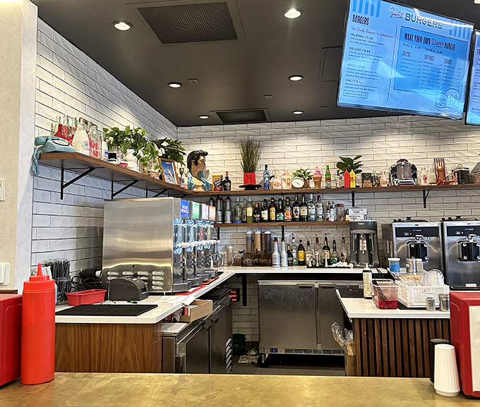 White subway tiles and wooden accents create a backdrop where milkshakes and burgers become the stars of their own delicious show.