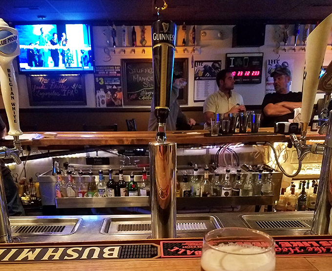 Behind every great Irish pub is a Guinness tap standing tall like a sentinel. The bartender's stance says, "I've heard it all, pal."