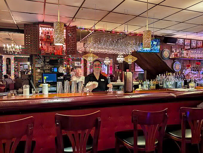 A bar that knows its purpose: to serve serious drinks to serious steak lovers. Note the hanging glasses&mdash;they mean business here.