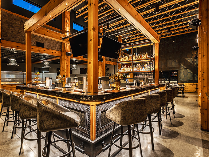A bar that says "pull up a seat and tell me about your day" without saying a word. Those wooden beams aren't just architectural—they're conversation starters.