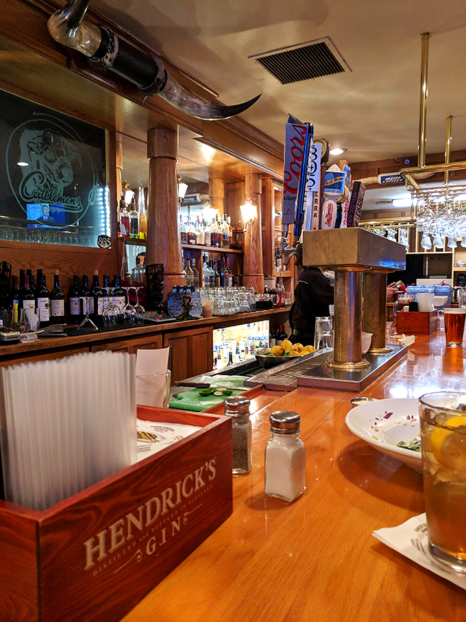 The bar at Cattlemens isn't just where drinks are poured&mdash;it's where friendships are forged and local legends are born.