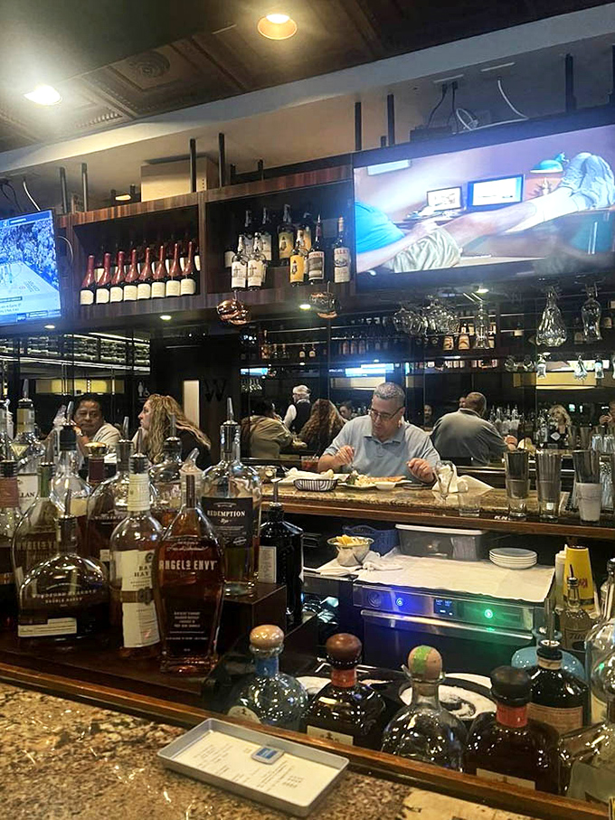A bar stocked better than most people's retirement portfolios. The perfect place to debate the merits of stone crabs versus king crabs.