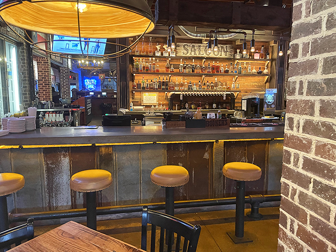 The bar area beckons with its "Texas Saloon" sign and impressive spirits collection&mdash;a watering hole where bourbon and beef are equally revered.