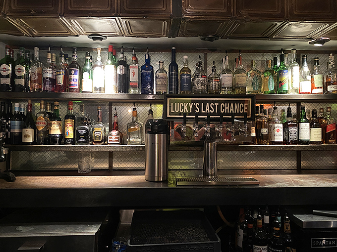 Behind the bar, bottles line up like soldiers ready to create liquid magic for thirsty customers.