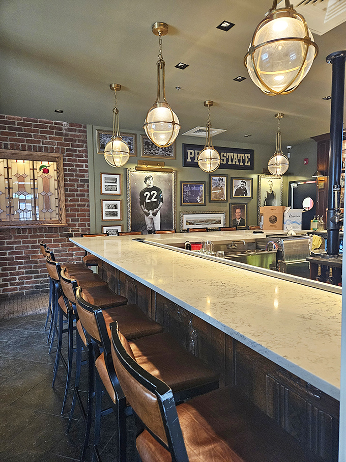 The bar area pays homage to Penn State with memorabilia and nautical-inspired lighting that makes every drink feel like a special occasion.