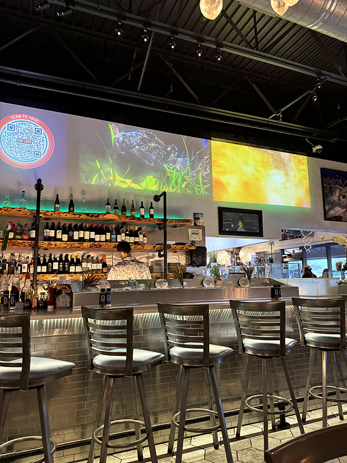 The bar area glows with possibility&mdash;and enough bottles to ensure your seafood feast comes with the perfect liquid companion.
