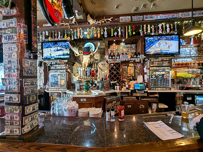 A bar that understands its mission: provide libations, sports viewing, and dollar bills on the wall for that "we've been here forever" vibe.