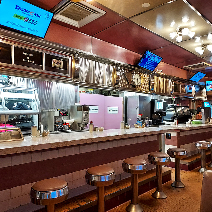 The classic diner counter where coffee flows freely and breakfast conversations create lifelong friendships.
