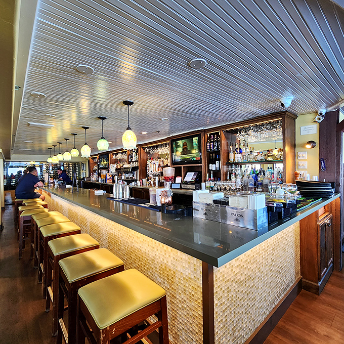 A bar that understands the importance of proper lighting, comfortable seating, and the therapeutic value of watching someone mix your drink.
