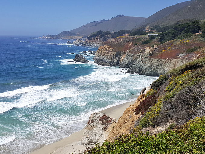 Where mountains dive dramatically into the sea. This coastline looks like California showing off what 100 million years of geology can accomplish.