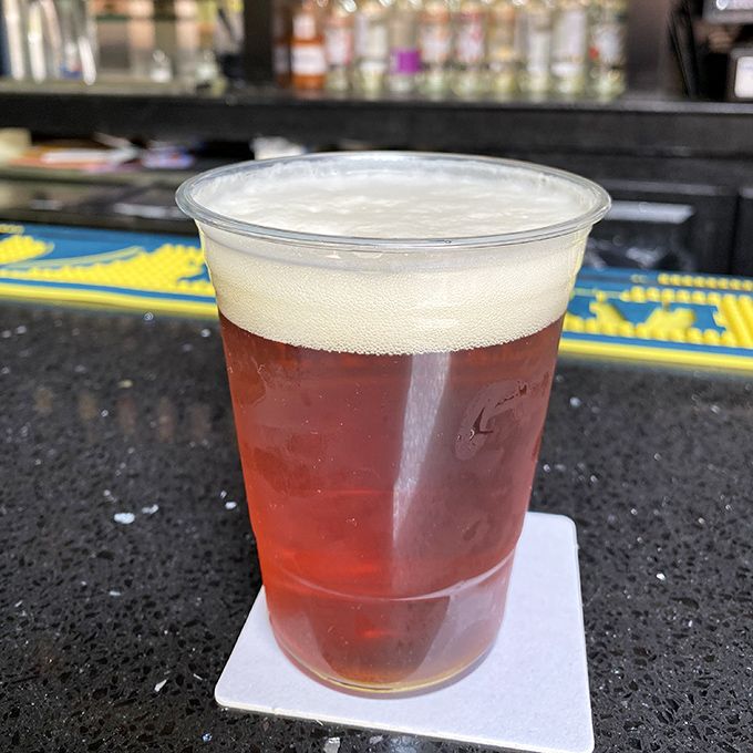 A golden pint sporting the Barnaby's logo&mdash;because sometimes your thirst can only be quenched by something cold, hoppy, and local.