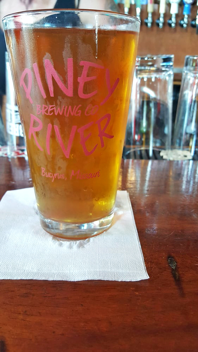 Liquid gold in a glass. This Piney River brew represents Missouri's thriving craft beer scene, perfect for washing down Lindberg's hearty offerings. 