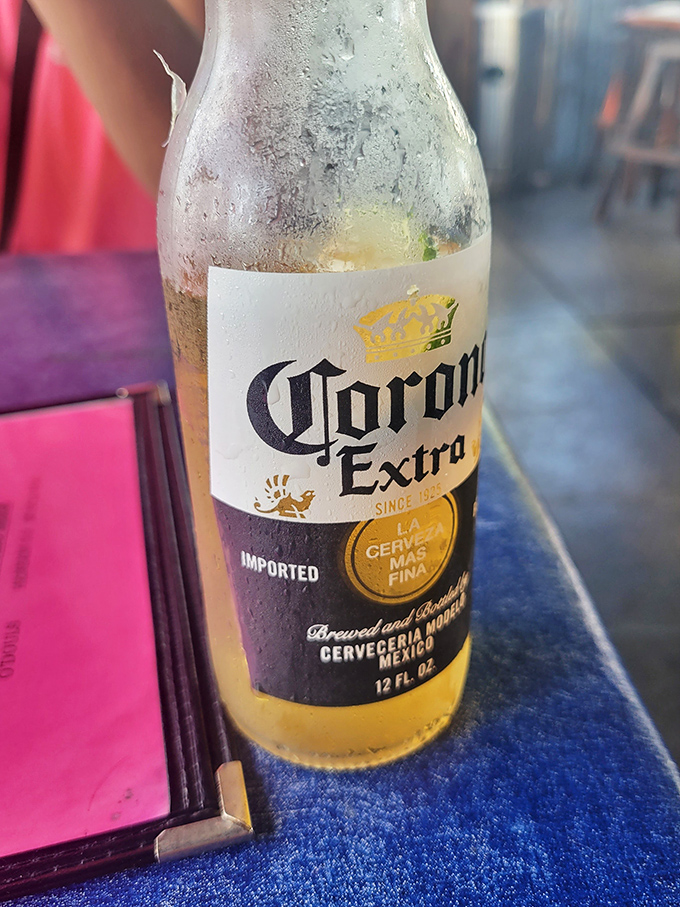 A perfectly chilled Corona&mdash;because sometimes the best companion to Florida seafood is Mexico's finest. Lime wedge standing by.