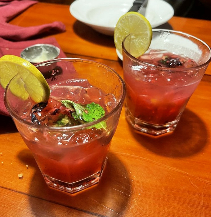 Berry mojitos that look like liquid sunset—refreshing, vibrant, and dangerously easy to enjoy. The perfect sidekick to a serious steak.
