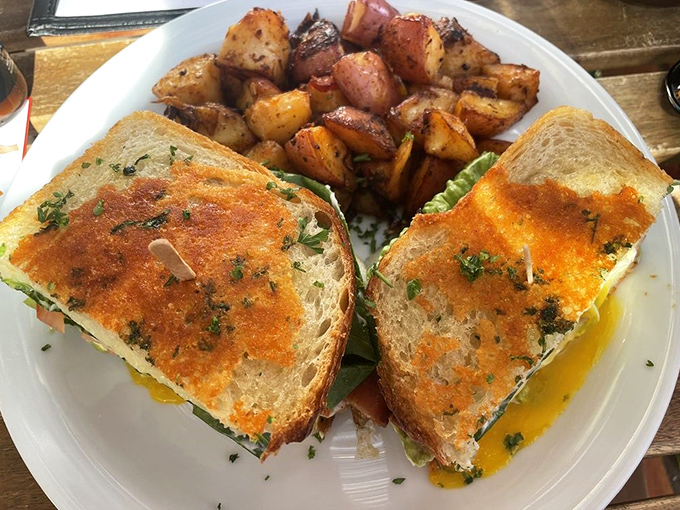 This sandwich isn't just breakfast, it's an architectural achievement&mdash;layers of flavor held together by perfectly toasted bread and hope.