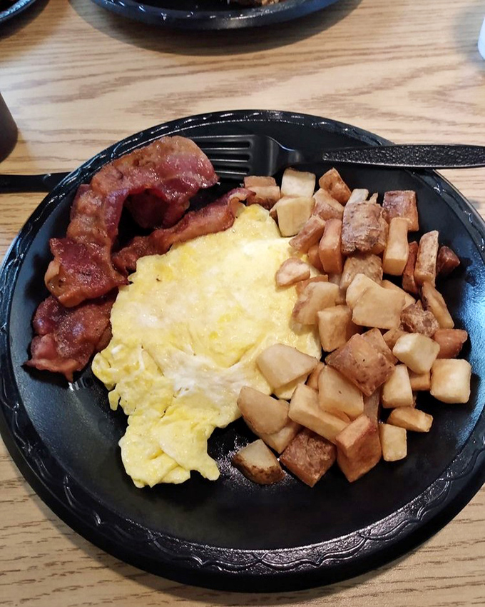 The breakfast plate that answers the eternal morning question: "Why choose between bacon, eggs, and potatoes when you can have the holy trinity together?"