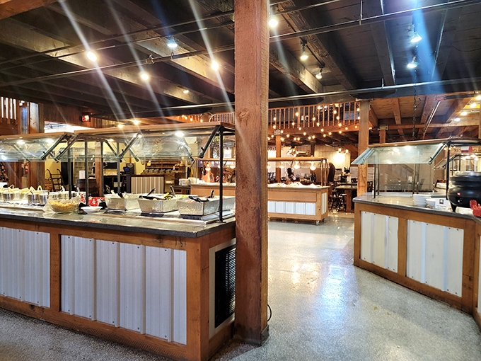 A buffet station built with the same attention to detail as the barn itself&mdash;rustic wood panels framing an array of homestyle offerings.