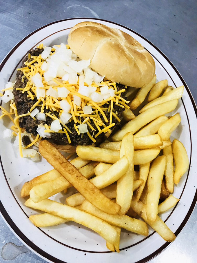 The classic American cheeseburger with a side of nostalgia. No foodie trends needed when you've mastered the basics this well.