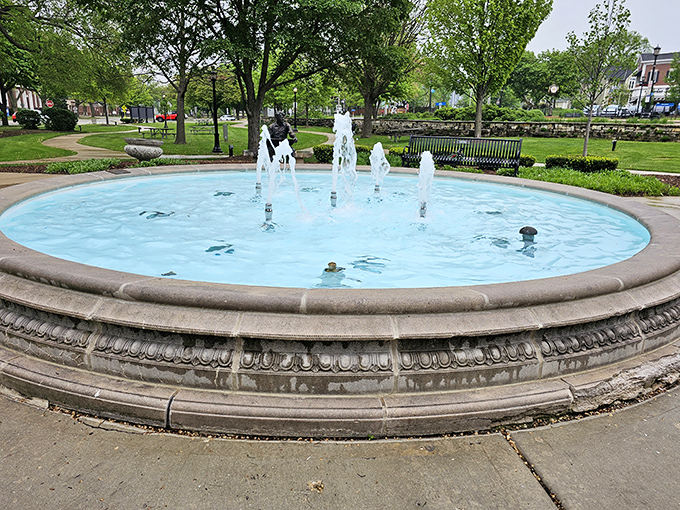 Burlington Park's fountain creates a soothing soundtrack for downtown strolls, proving that sometimes the simplest pleasures make the deepest impression.