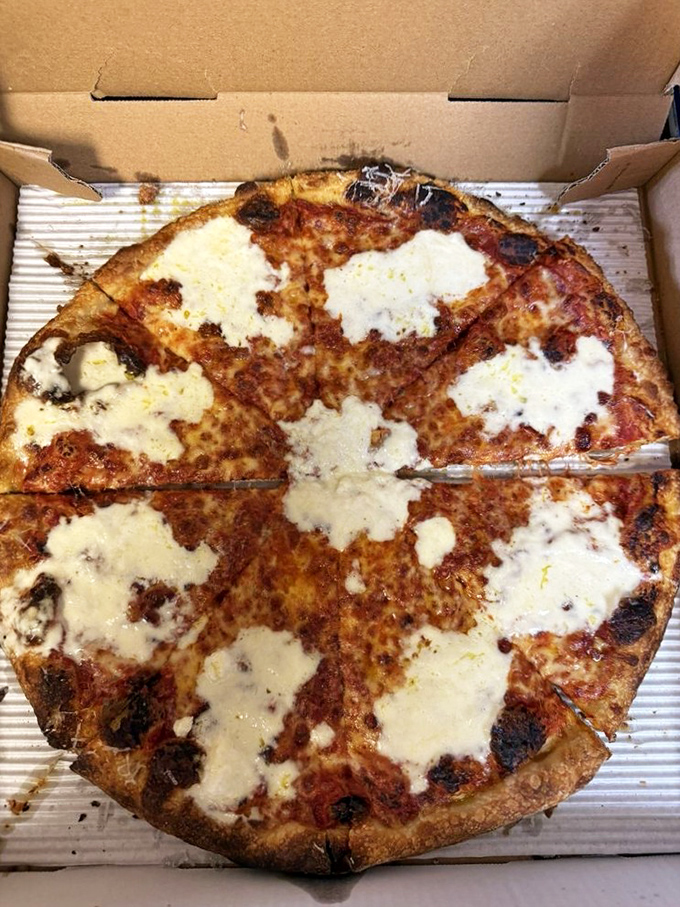 The cheese-to-sauce ratio on this pie would make even the most stoic New Yorker shed a tear of respect and admiration. 