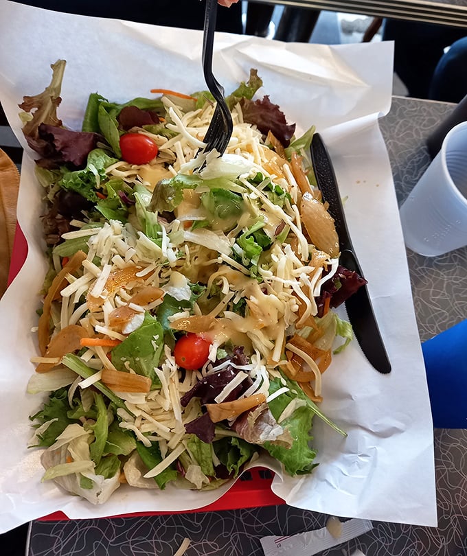 Even the salad gets the star treatment. Those cherry tomatoes are like little jewels in a crown of smoked meat and cheese.