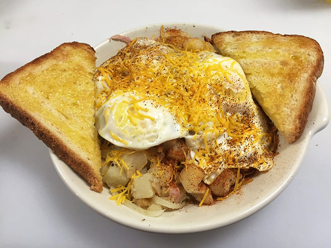 Breakfast that doesn't care what time it is. Golden toast, perfectly seasoned potatoes, and eggs that make mornings worth facing. 