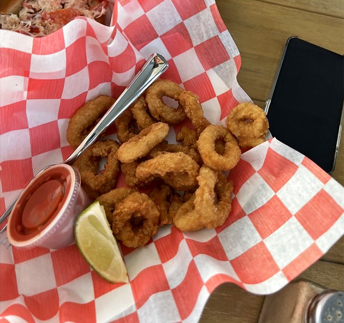 Calamari so perfectly fried, it should have its own Instagram account. The lime wedge isn't just garnish—it's essential supporting cast.
