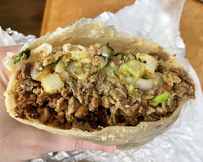 The California burrito: where French fries found their true calling as the surprise guest star in a tortilla-wrapped masterpiece.