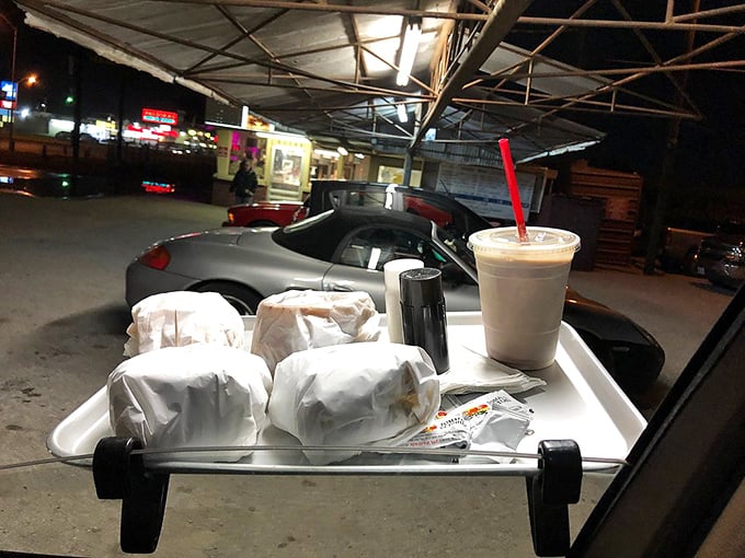 The classic carhop service tray&mdash;hooked to your window like it's 1955. Some traditions deserve preservation, especially when they involve cheeseburgers.