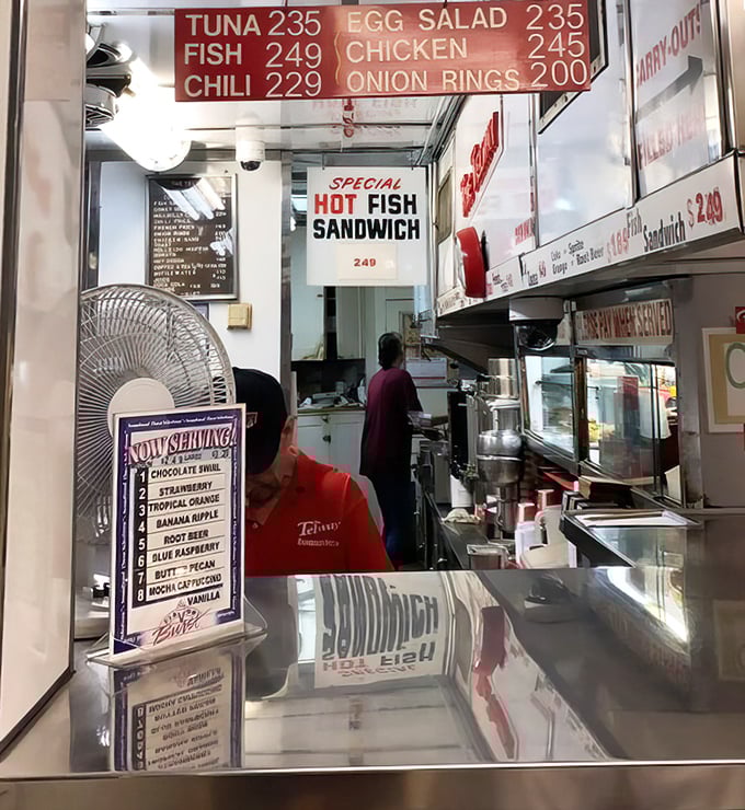 Behind every great diner is a shake menu that refuses to acknowledge the passage of time. Blue Raspberry still living its best life here.